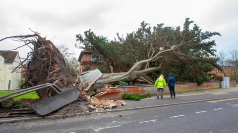 In pictures: Storm Darragh causes disruption across the UK - BBC News