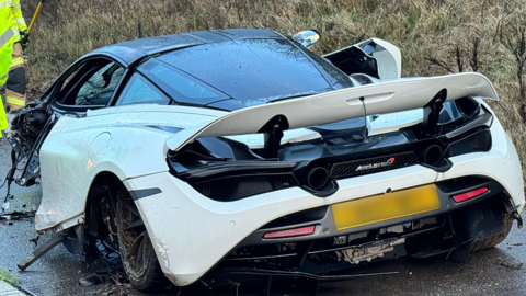 McLaren crashes and bursts into flames on M54 - BBC News