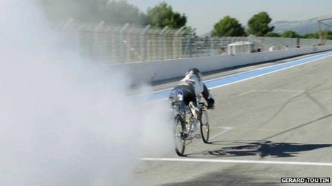 Rocket bicycle sets 207mph speed record - BBC News