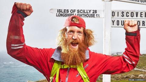 Adventurer Sean Conway completes 'ultimate triathlon' - BBC News