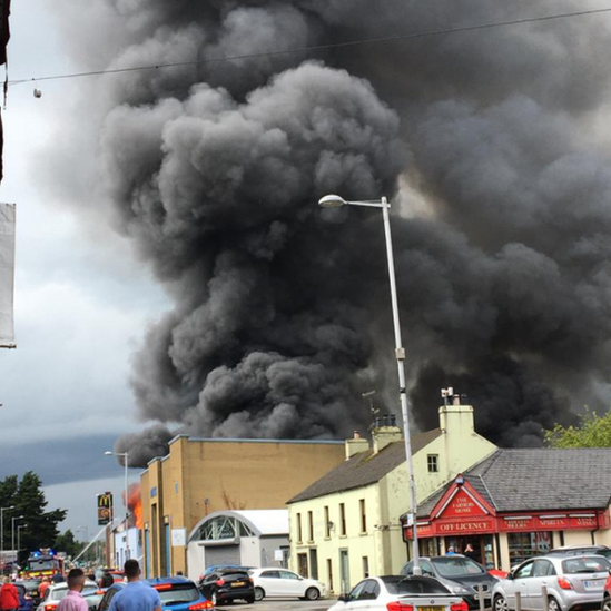 Strabane: Large fire has broken out at coffin makers - BBC News