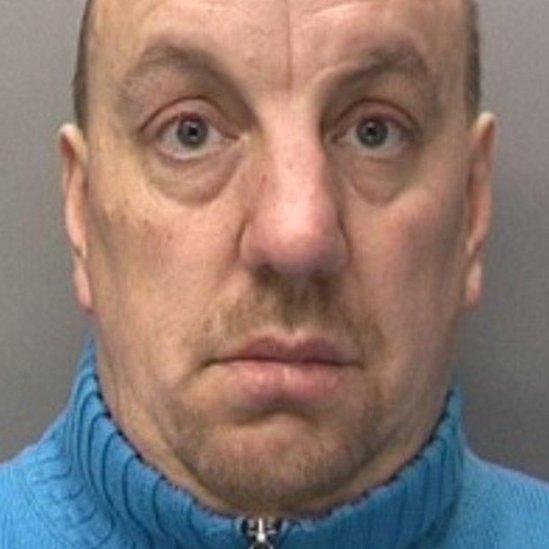 Man jailed for throwing slab at Coventry police car - BBC News
