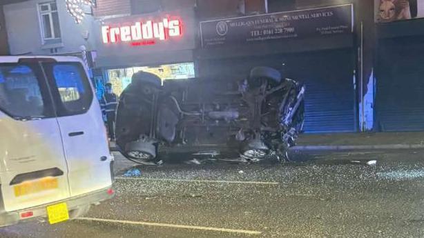 Man charged after car smashed into Manchester beauty salon window - BBC ...