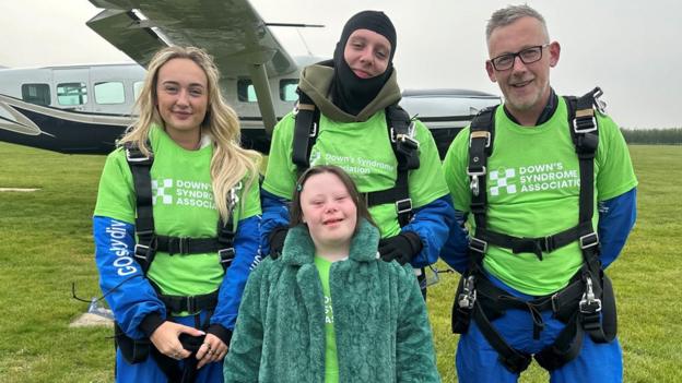 Aitch: Rapper's skydive in honour of his younger sister Gracie - BBC ...