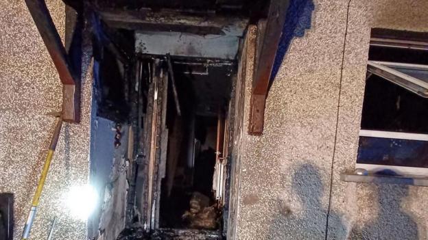 Antrim arson: House set on fire with pensioner inside - BBC News
