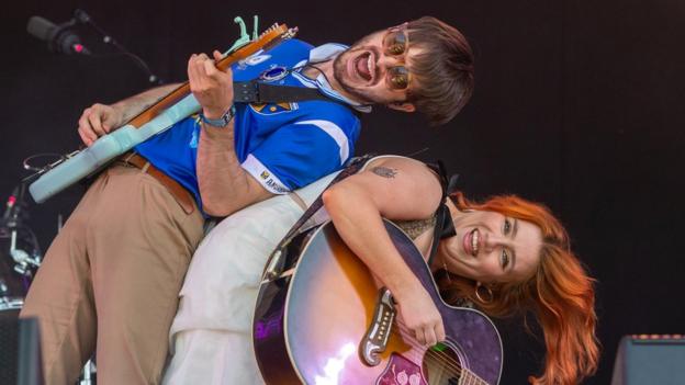 CMAT: Irish singer fractured her neck 'rocking out on stage' - BBC News