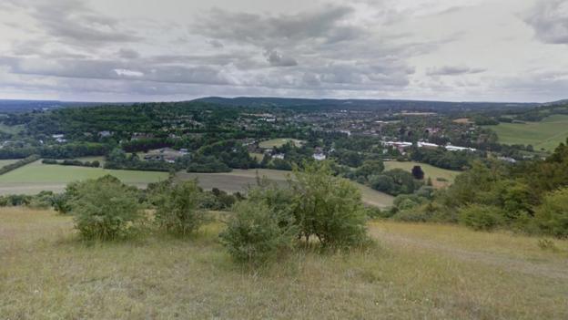 Mole Valley District Council approves 6,000 new homes plan - BBC News