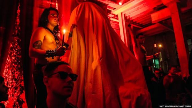 Decoding the symbols on Satan's statue - BBC News