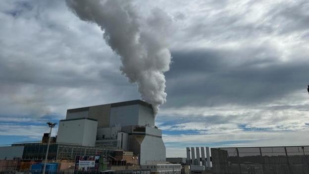 Hinkley C nuclear reactor roof lifted into place - BBC News