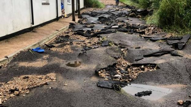 Chard flooding: People rescued and homes damaged - BBC News