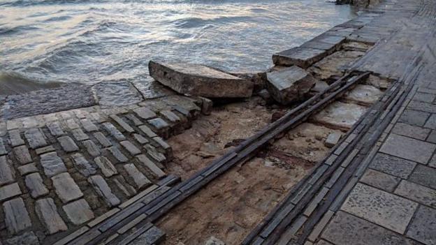 Cargo ship hits barge in Storm Angus - BBC News