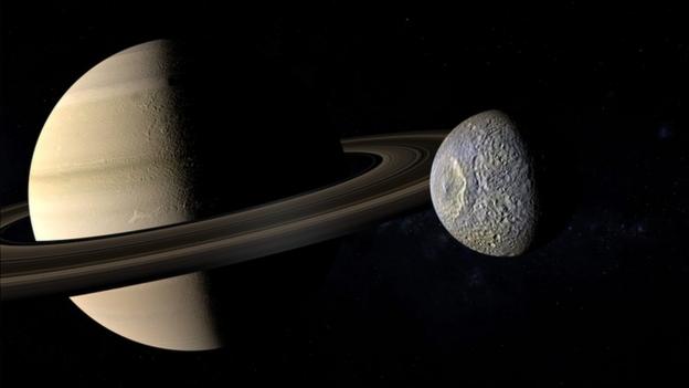 Mimas: Saturn's moon may have ocean beneath icy surface - BBC Newsround