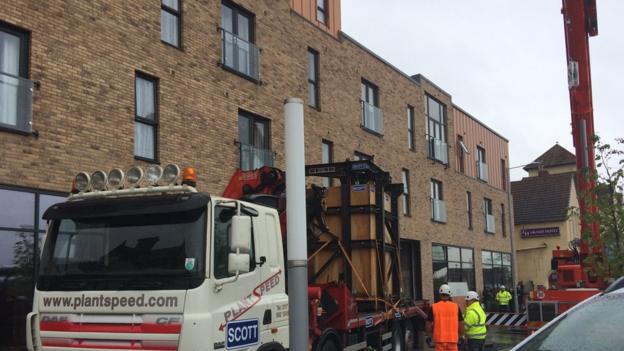 Port Talbot Banksy mural: Artwork arrives at new home - BBC News
