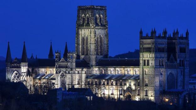 Durham Cathedral interior illuminated in stunning colours - BBC News
