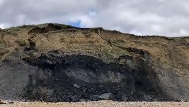 Cliff fall danger warning after 'huge' collapse at Seatown - BBC News