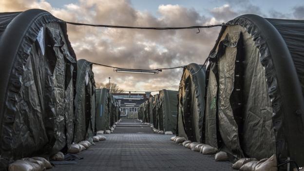 Migrant crisis: Why are countries taking refugees' valuables? - BBC News