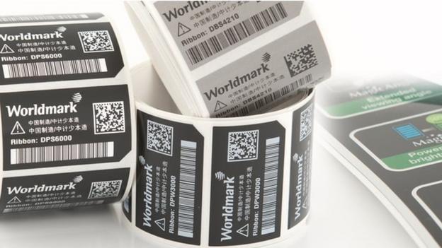 Canadian firm buys label specialist Worldmark in £126m deal - BBC News