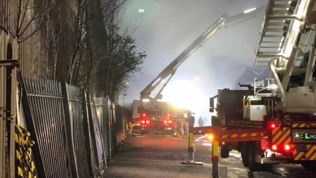 Willenhall fire: Food factory blaze response scaled back - BBC News