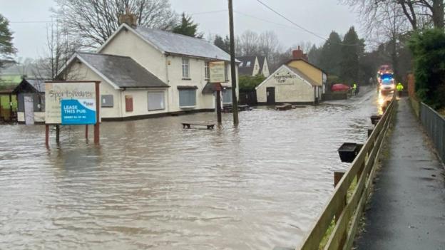 Weather: Floods in Wales cause power cuts and train delays - BBC News