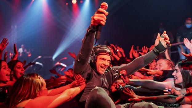 Robbie Williams explains why he's a monkey in his new movie - BBC News