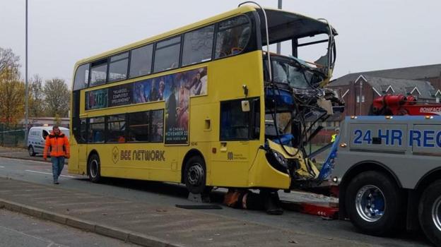 Manchester double-decker bus crash leaves 17 people injured - BBC News