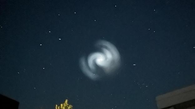 SpaceX launch: Glowing spiral seen above UK skies - BBC News
