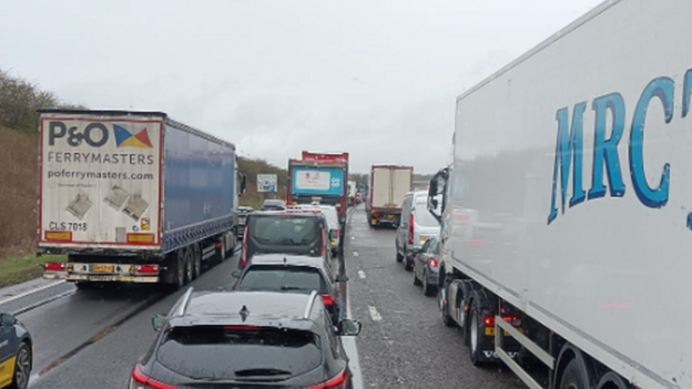 Drivers delayed as flooding closes A14 on Suffolk-Cambs border - BBC News