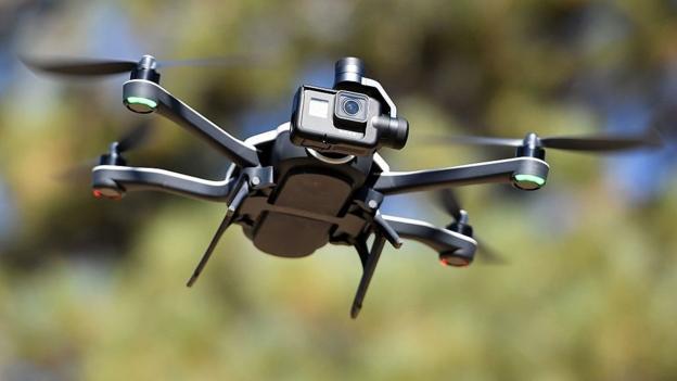 Man jailed for hitting woman with drone - BBC News