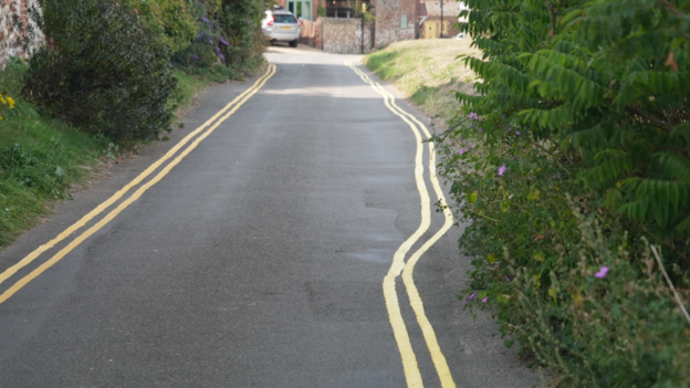 Wonky yellow lines painted on Old Hunstanton roads in Norfolk - BBC News