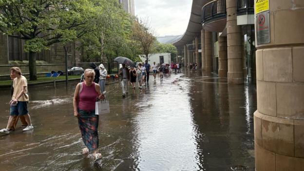 Shopping centre evacuated after heavy rain and hail hit Dundee - BBC News