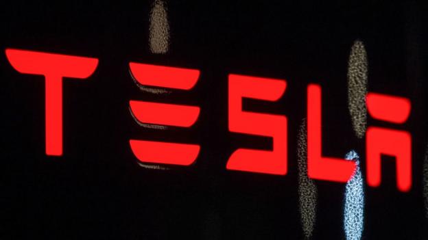 Tesla lays off more than 10% of its workforce - BBC News