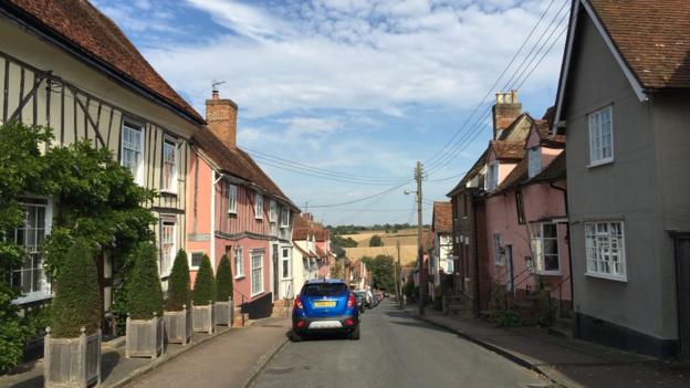 The village building homes for young families - BBC News