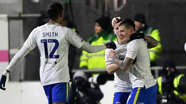 AFC Wimbledon up to second after win at Newport - BBC Sport