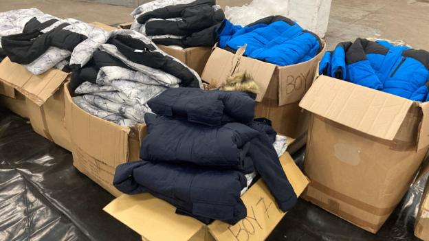 hundreds of pupils without coats missing school, charity says - BBC News