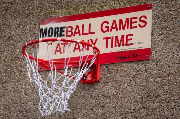 'No ball games' signs replaced with basketball hoops in London - BBC ...