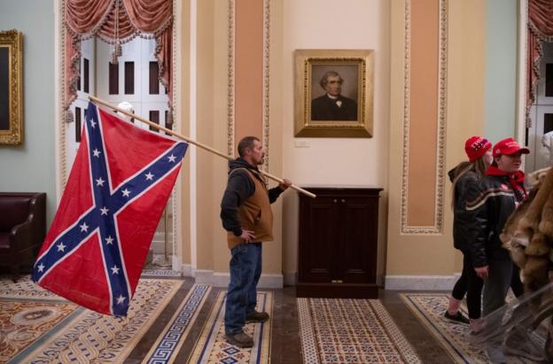 January 6: The day that still divides America, three years on - BBC News