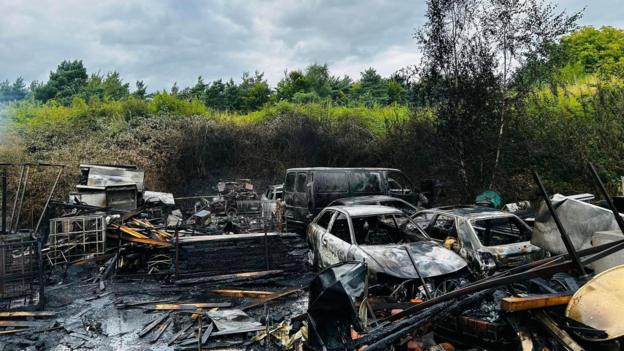 Barnham industrial estate fire destroys six cars and pallets - BBC News