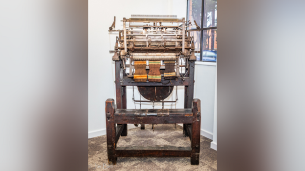 Belper's historic knitting machine back on display - BBC News
