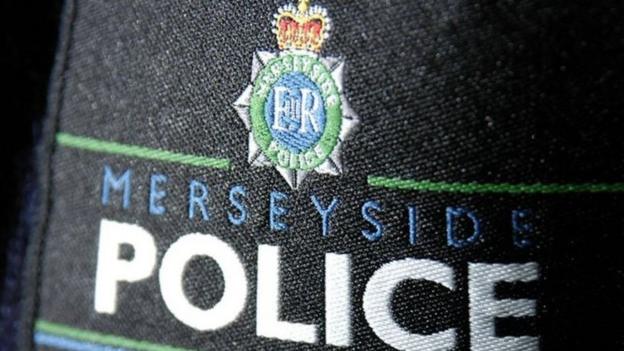 Merseyside PC stands down after punching man - BBC News