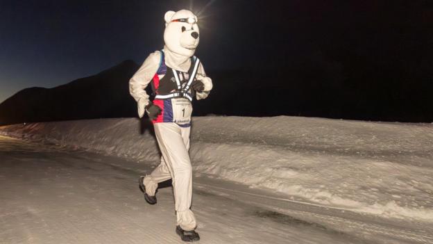 Teacher sets Guinness World Record running ice marathon as a polar bear ...