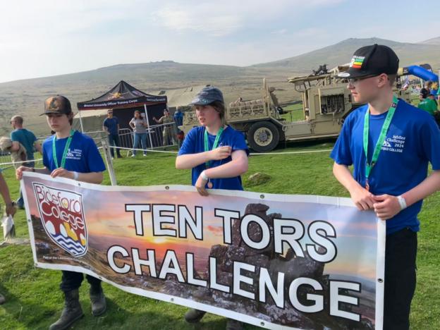 Ten Tors challengers cross the finish line on Dartmoor - BBC News