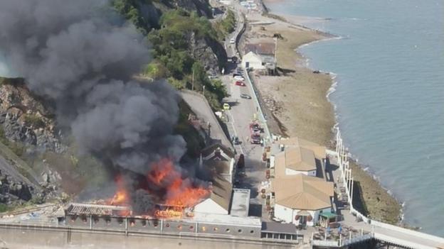 Mumbles Pier: Extent of fire damage seen from above - BBC News