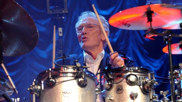 Ginger Baker: Legendary Cream drummer dies aged 80 - BBC News