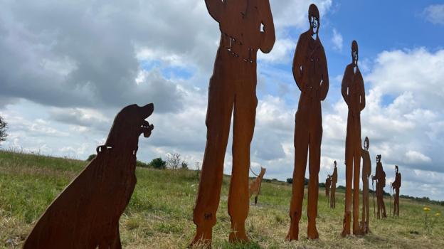 Giant warning statues on Salisbury army land approved - BBC News