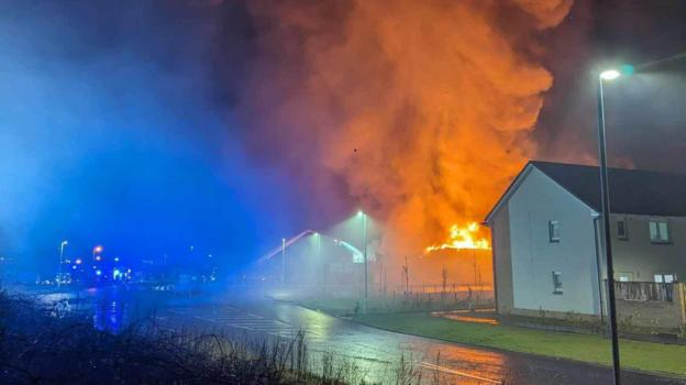 Firefighters spend second night at Kilwinning battery plant blaze - BBC ...