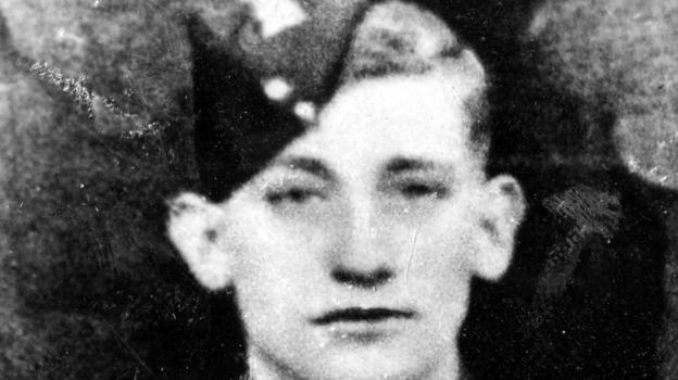 WW2 helmets find linked to SS massacre of Royal Norfolk soldiers - BBC News