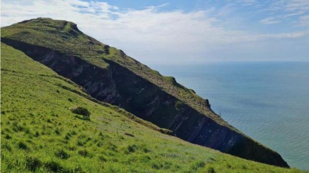 England's highest sea cliff Great Hangman is a 'monstrous climb' - BBC News