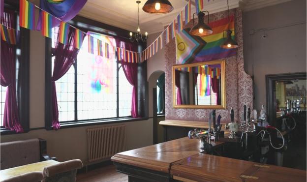 Pride: Wales' oldest gay bar remains amid developing city - BBC News