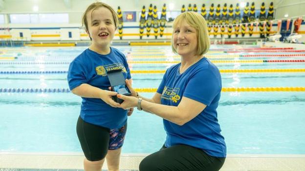 Boy attached to ventilator learns to swim at Bridlington pool - BBC News