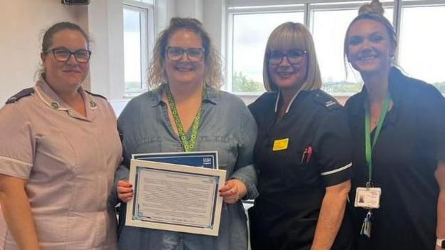 Peterborough midwife 'honoured' to get award - BBC News